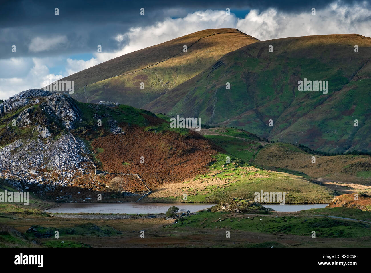 Llyn Dywarchen backed by Clogwynygarreg and the distant peak of Moel ...