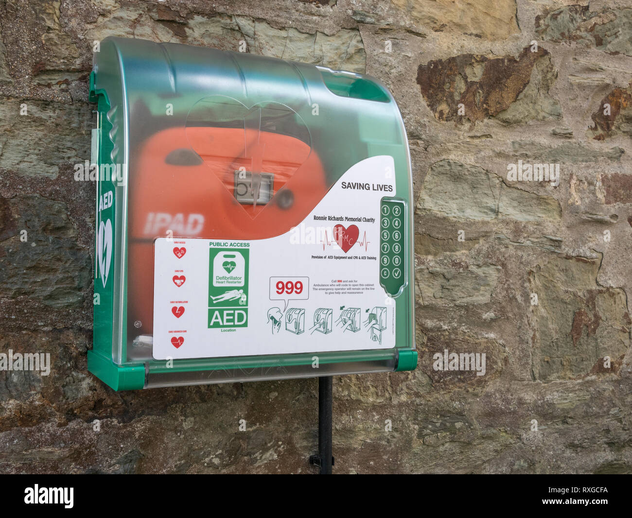 A Public Access Defibrillator / PAD fixed to an external wall Stock ...