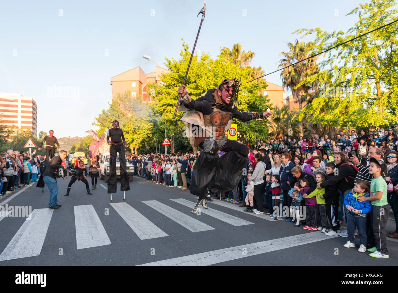 People masquerading as demons frightening people on the occasion of the ...