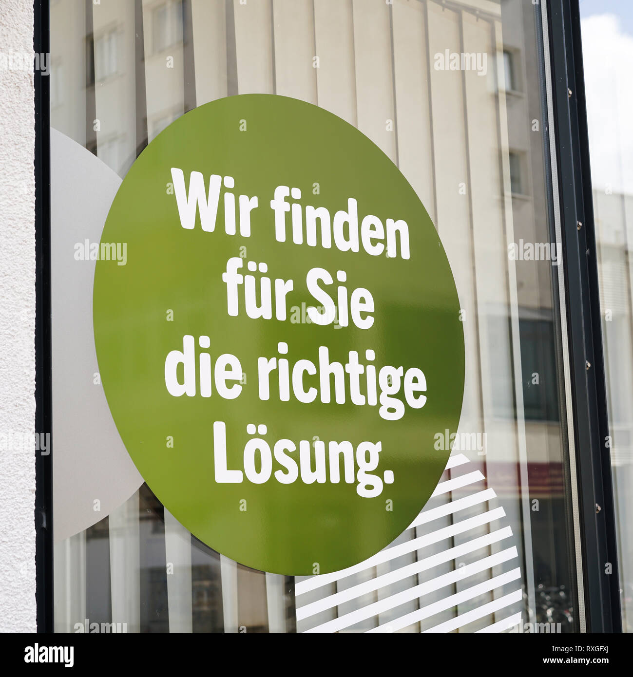 Sign saying "we will find the right solution for you Stock Photo - Alamy