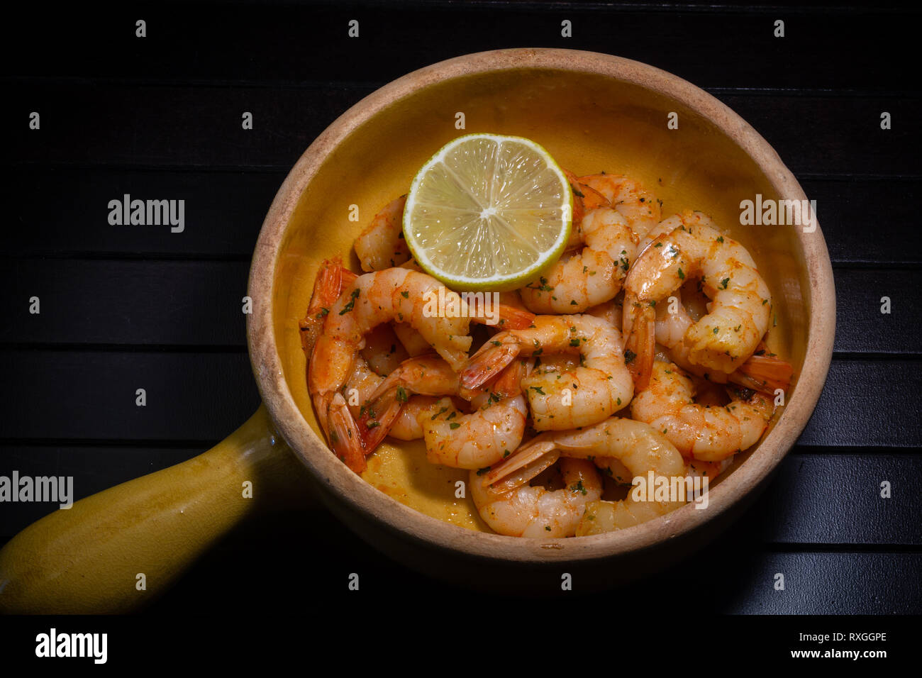 marinated and peeled shrimp prawn with slice of lemon Stock Photo - Alamy