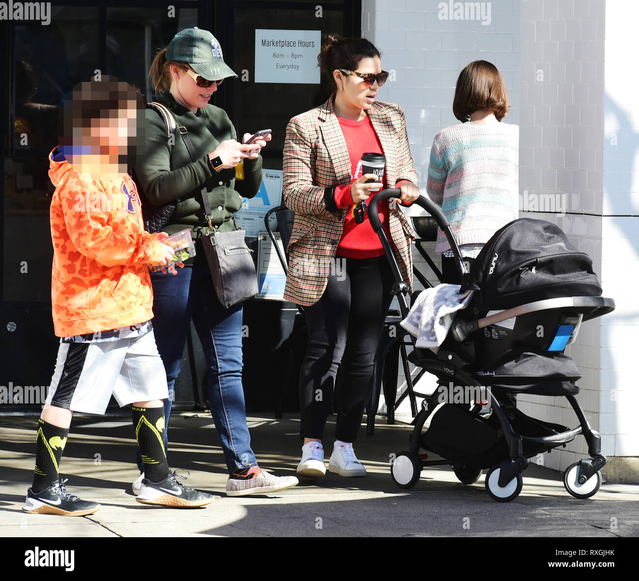 America Ferrera eats out with her family at Joan’s on Third in Los ...