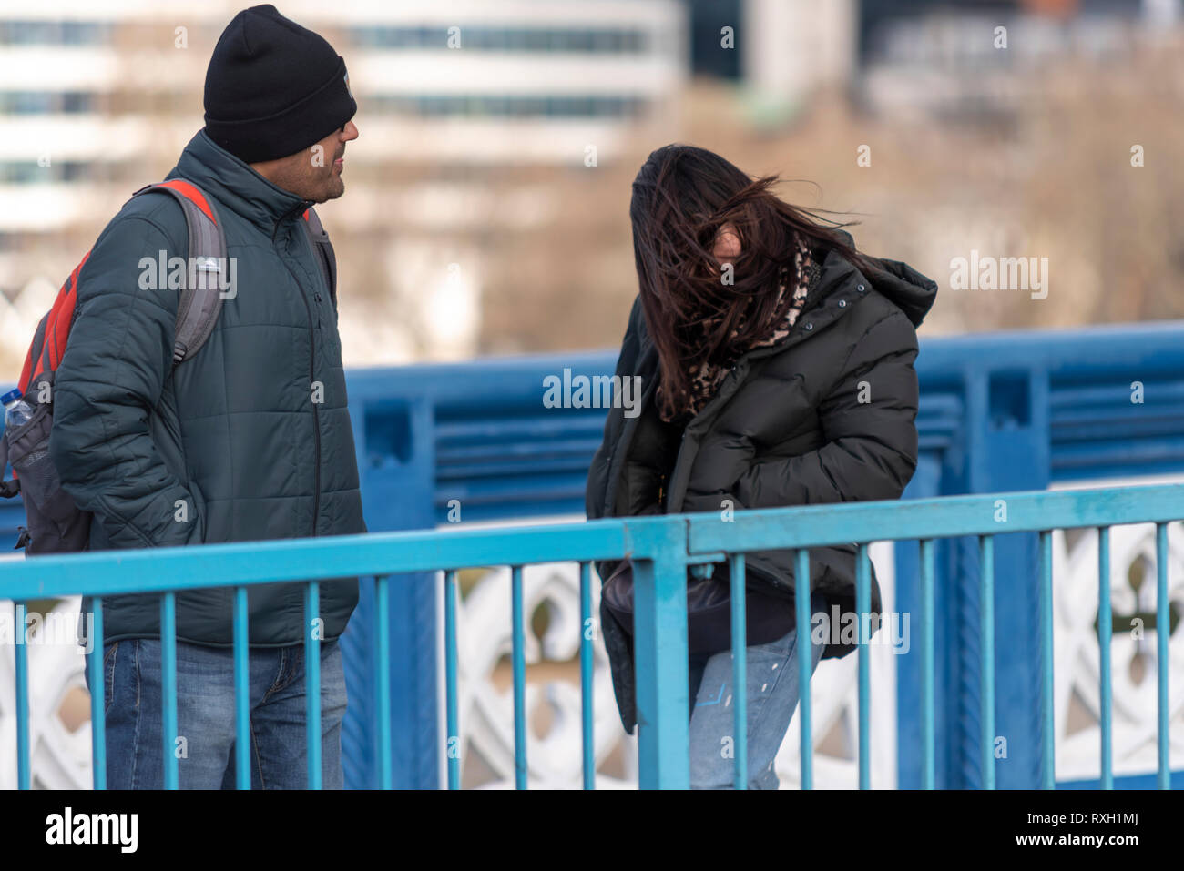 Strong winds have hit the capital as people cross Tower Bridge, London ...