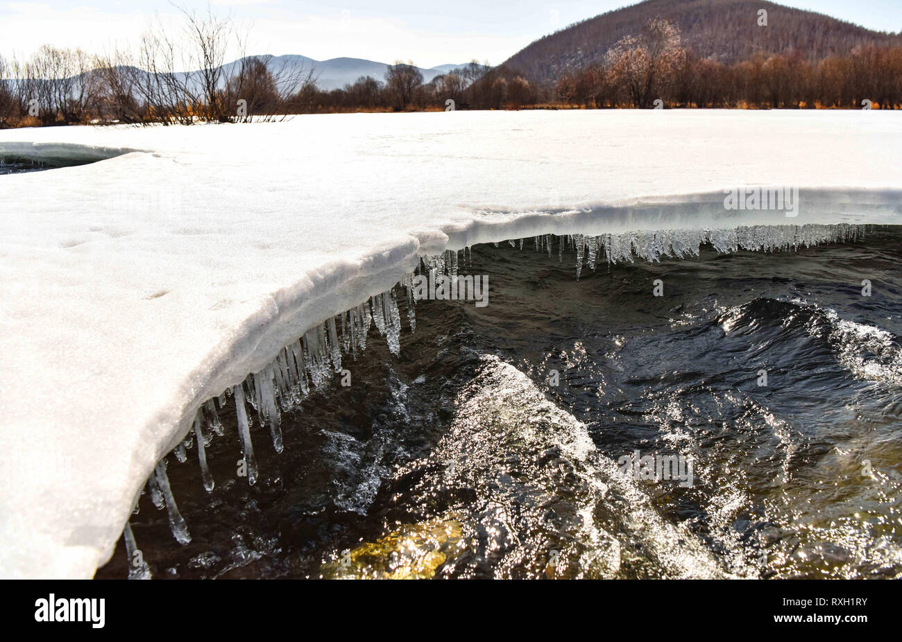 China. 10th Mar, 2019. Yakeshi, CHINA-Scenery of Yalu River in Yakeshi ...