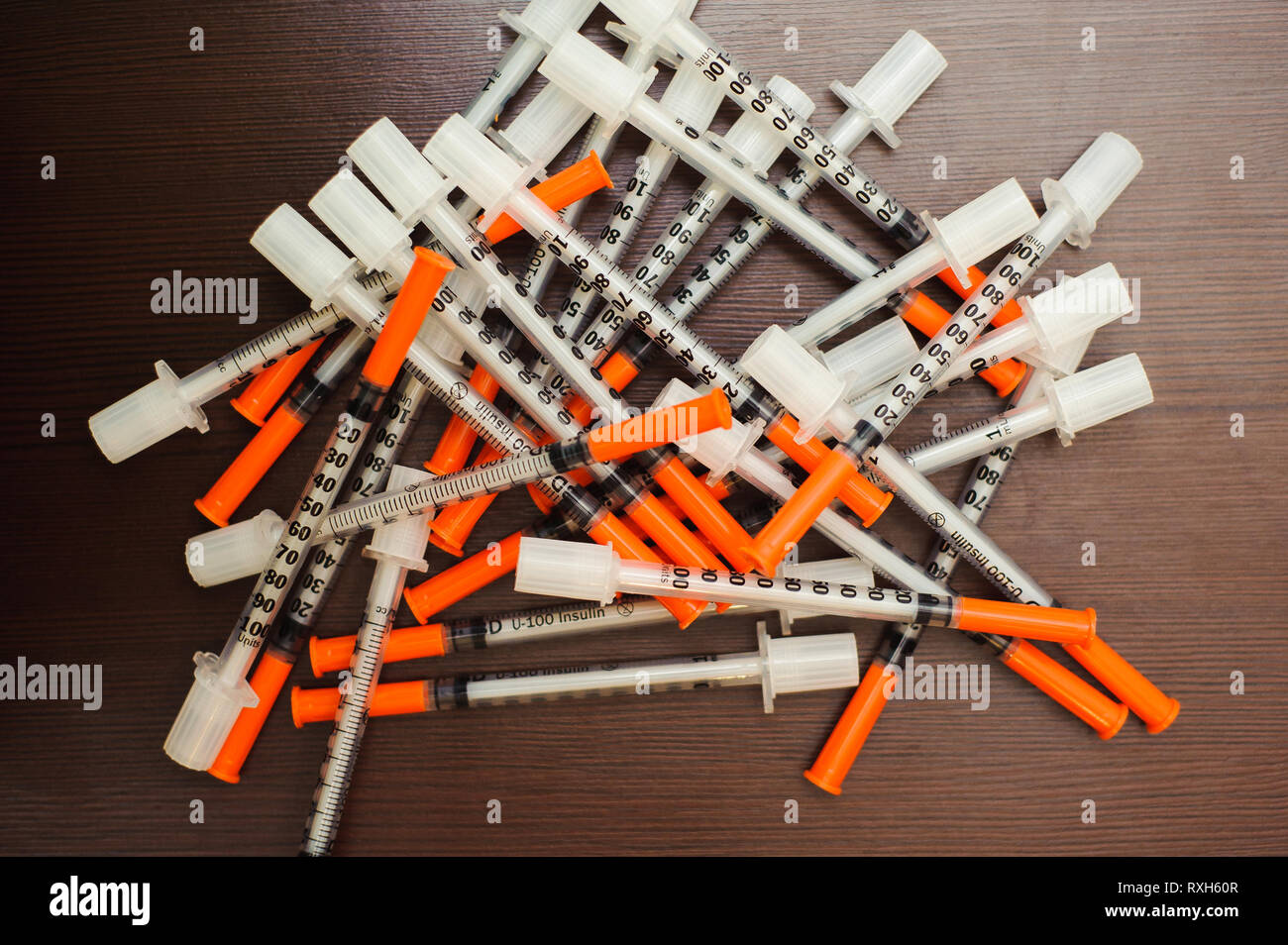 Pile of syringes for insulin, health care and people concept Stock ...