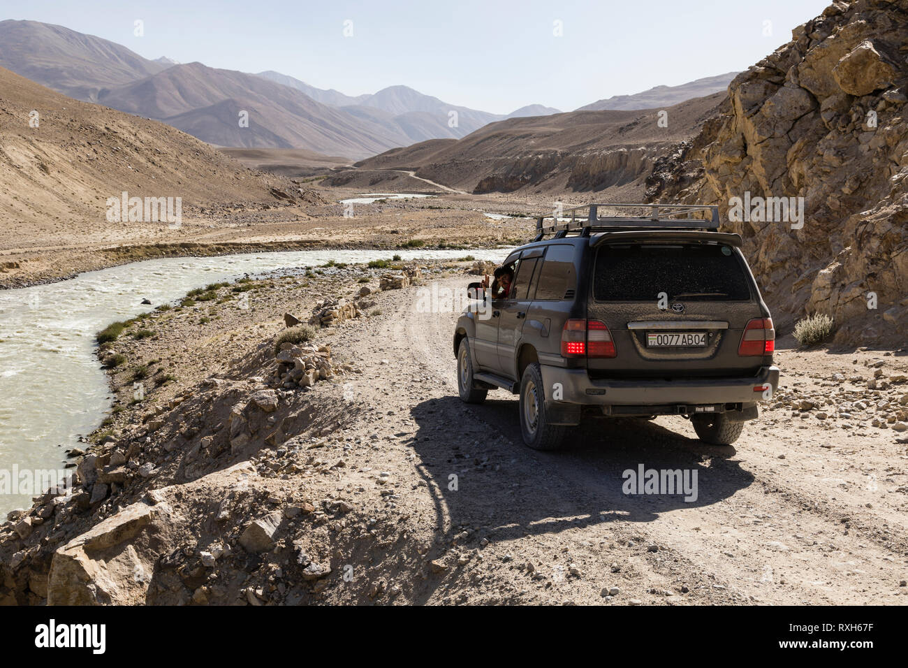 Langar, Tajikistan, August 23 2018: Off-road car is waiting on the ...