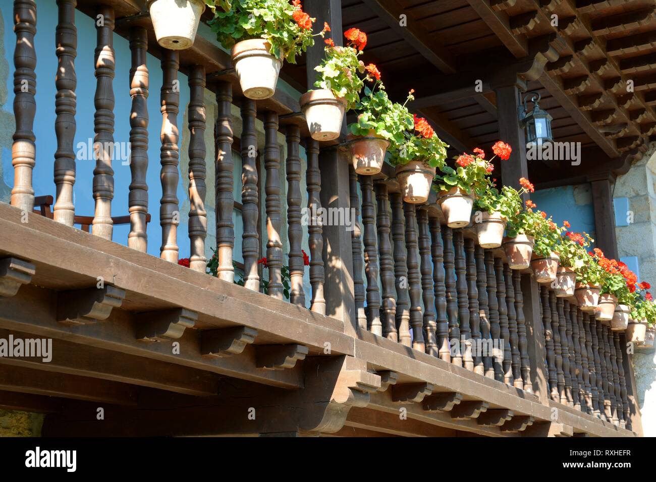 Wooden balcony geraniums hi-res stock photography and images - Alamy