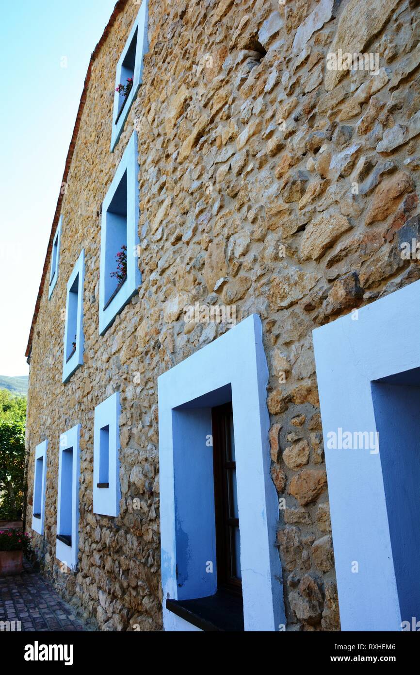 a house with the blue windows Stock Photo - Alamy