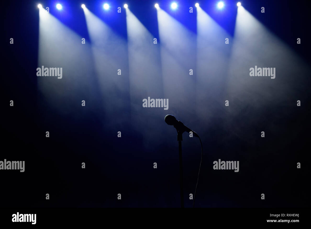 Singing microphone ready for singer. Live music background. Microphone ...