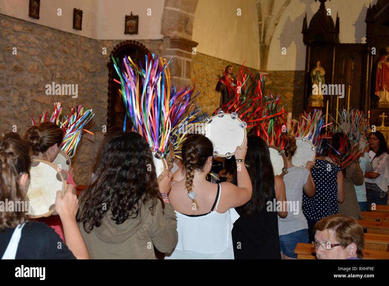 one party, people having fun inside a church playing the tambourine ...