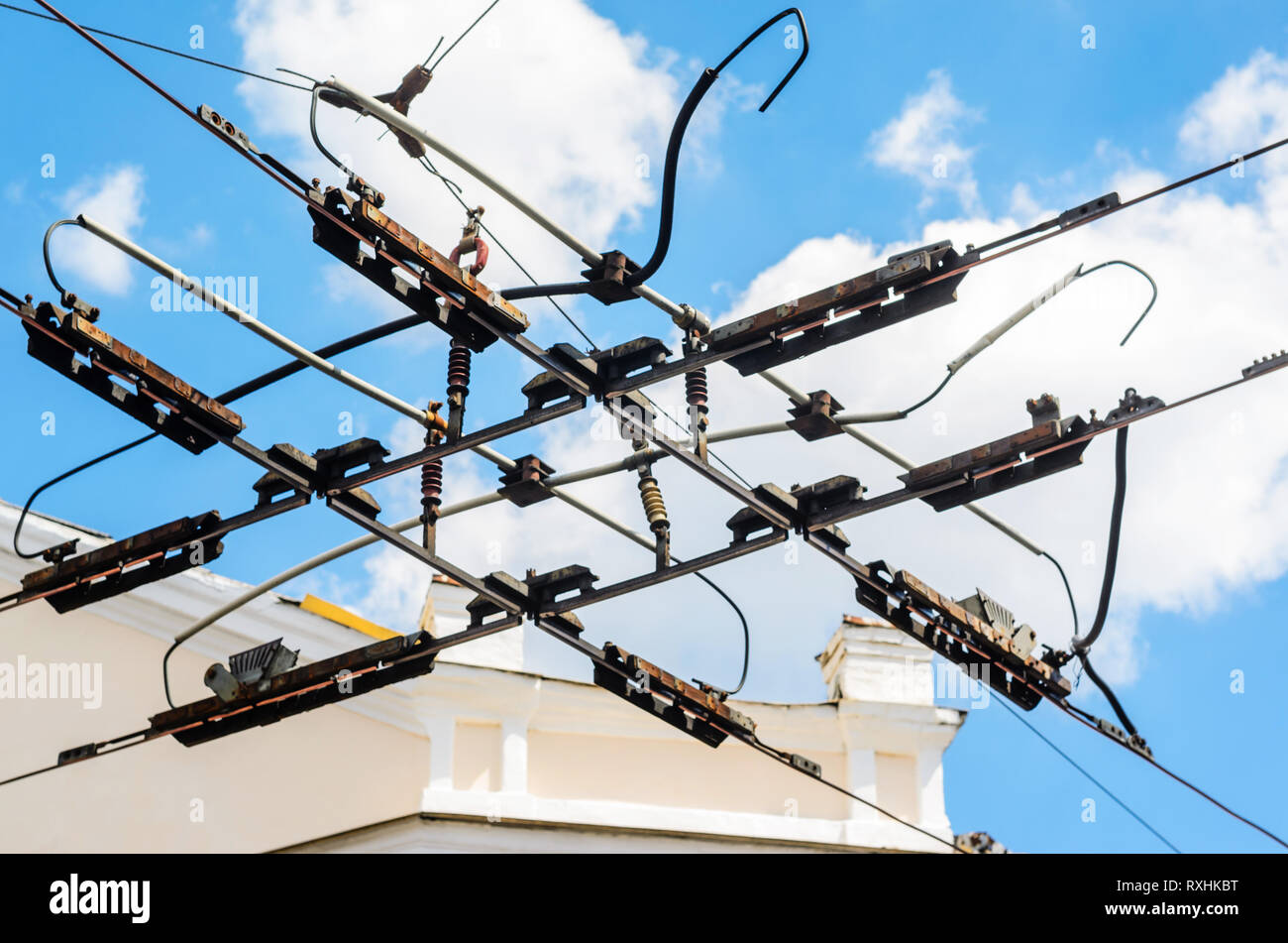 Wires for Trolley at the Intersection Against Blue Sky. Crossing of ...