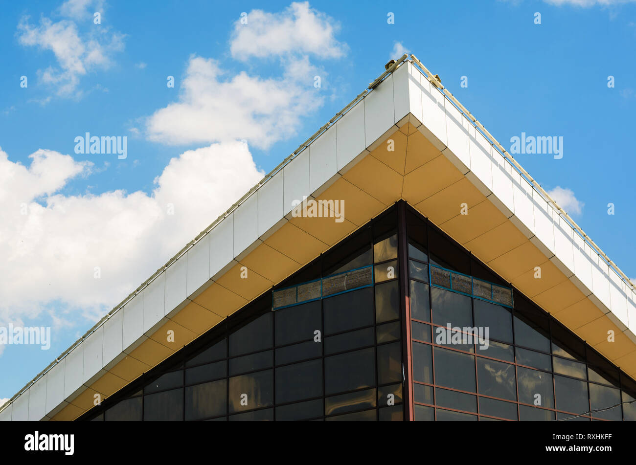 Modern Glass Facade Background Against Blue Cloudy Sky Stock Photo - Alamy