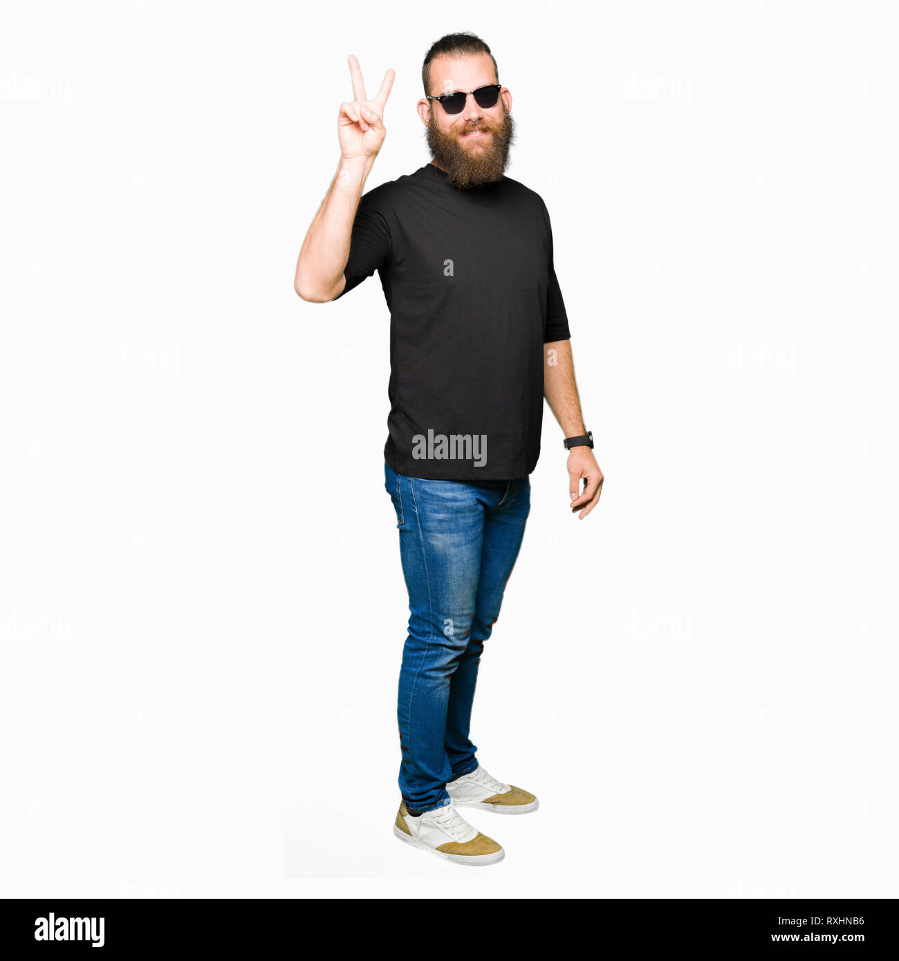 Smiling man winking wearing Cut Out Stock Images & Pictures - Alamy