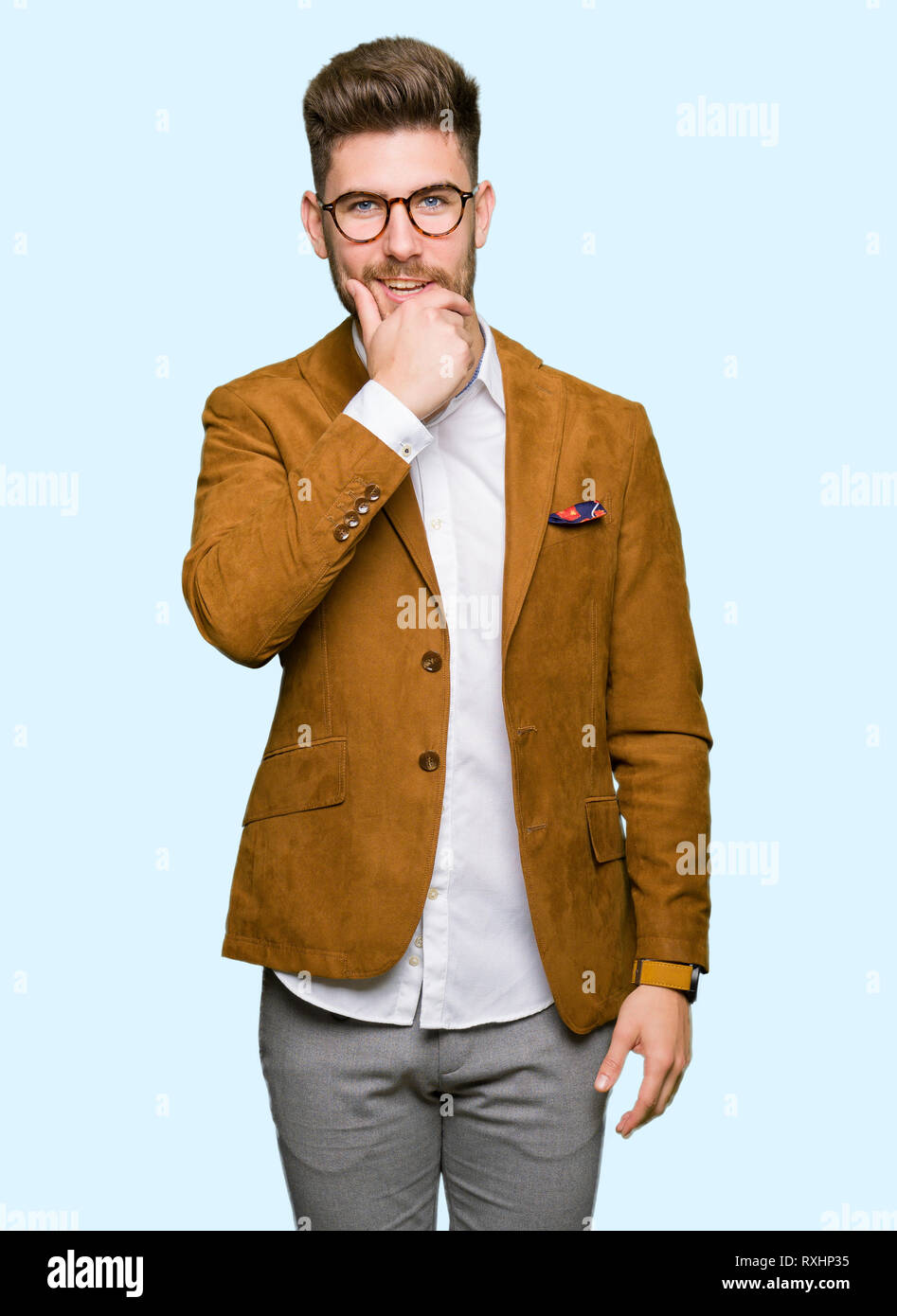 Young Handsome Business Man Wearing Glasses Looking Confident At The