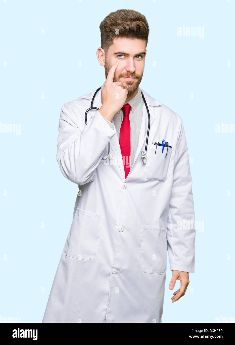 Angry pointing doctor young man hi-res stock photography and images - Alamy