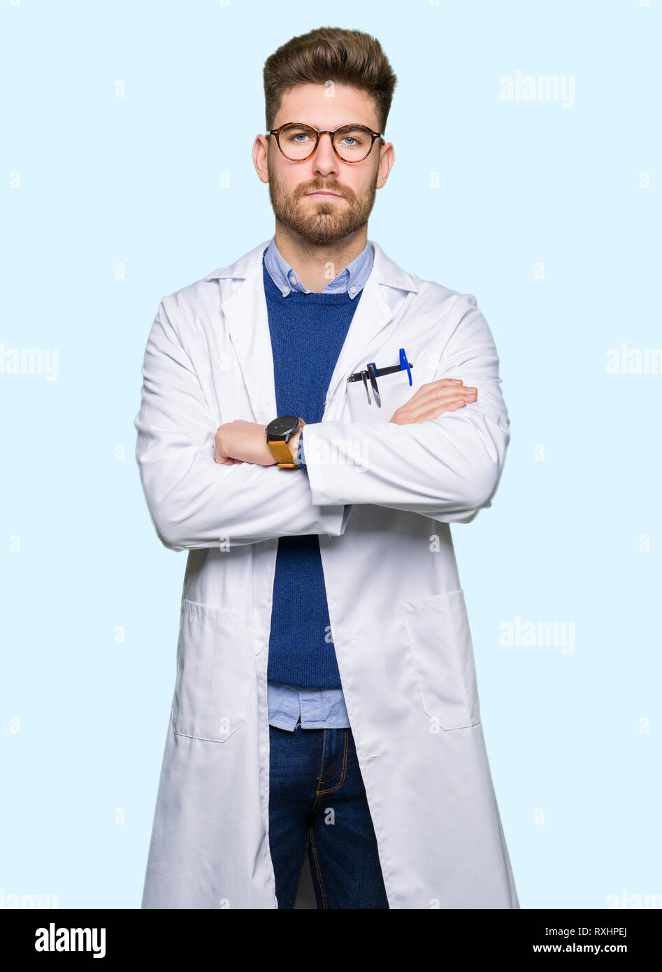 Young handsome scientist man wearing glasses skeptic and nervous ...