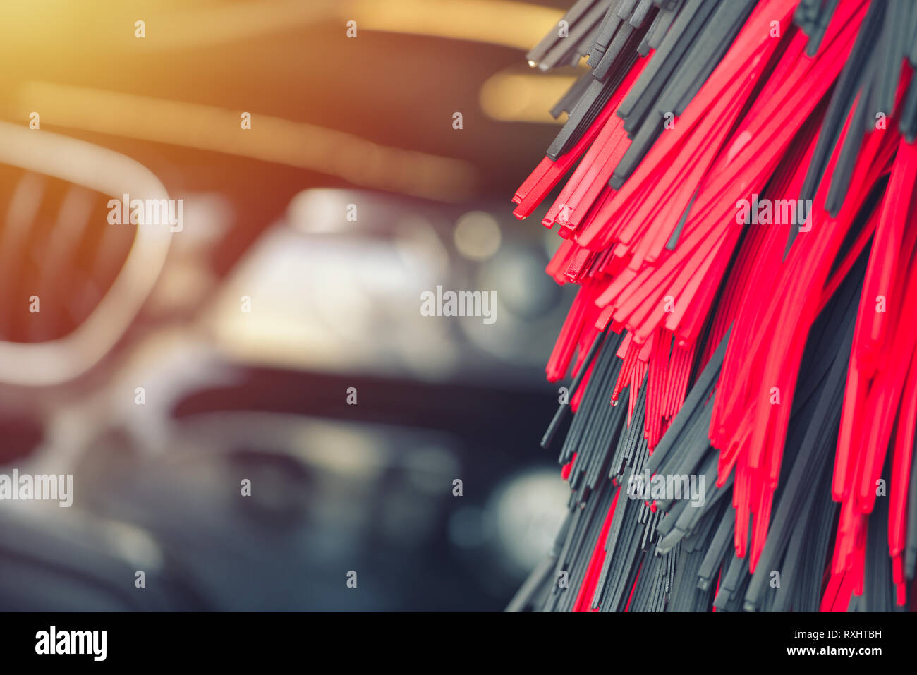 Automatic car wash in action. Car wash concept. Automated technology ...