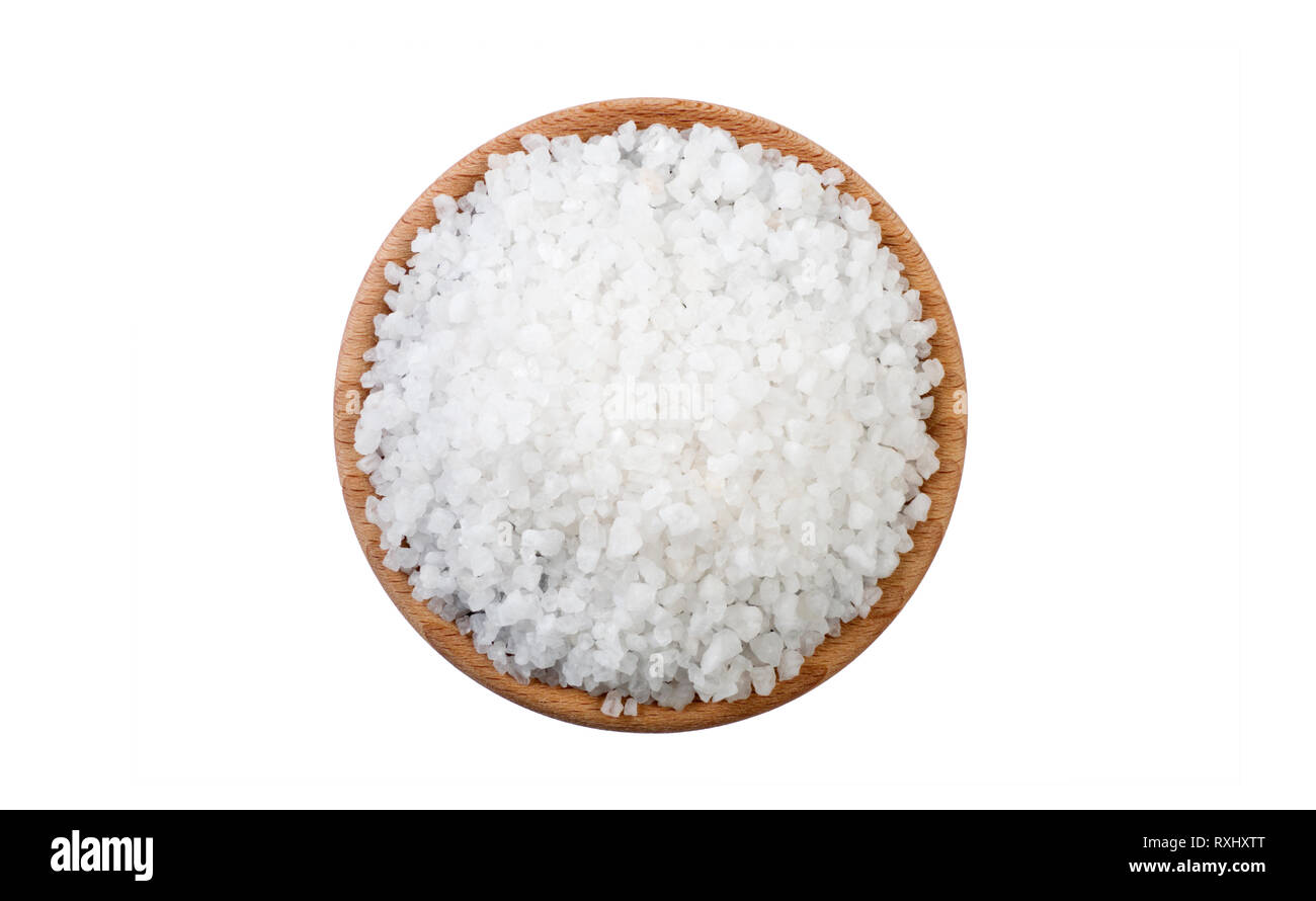 white salt crystals in wooden bowl isolated on white background. Spices ...