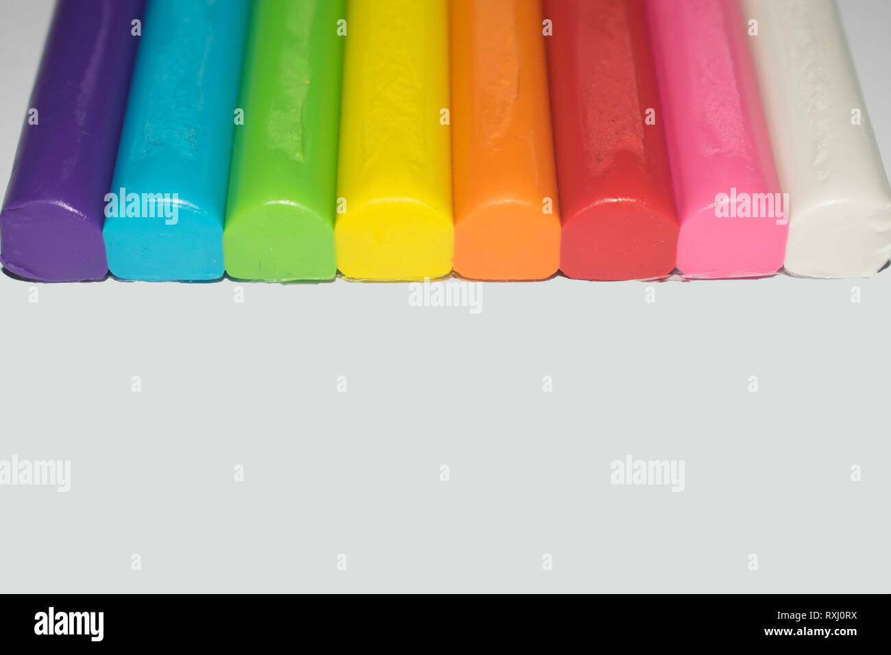 Colorful clay sticks in a row background, DIY arts Stock Photo - Alamy