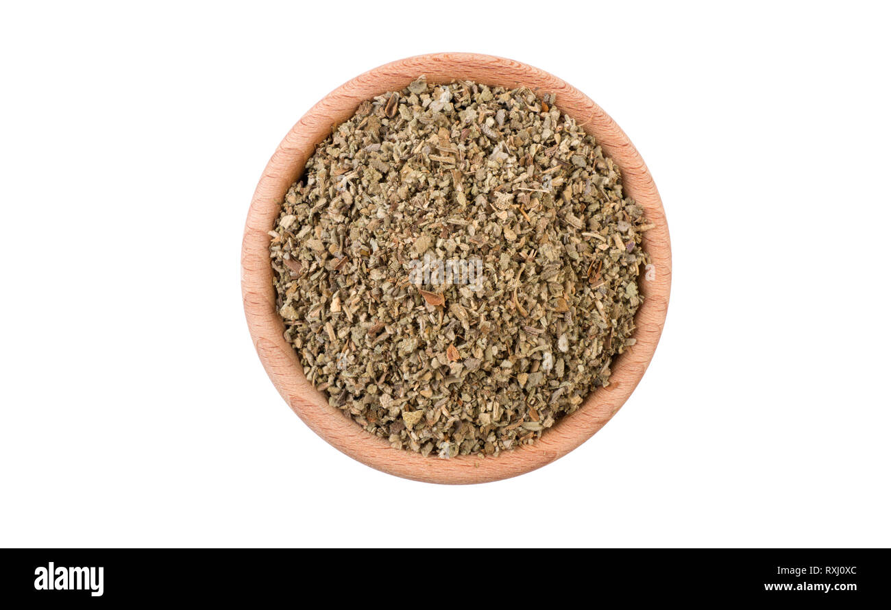salvia or sage in wooden bowl isolated on white background. Spices and ...