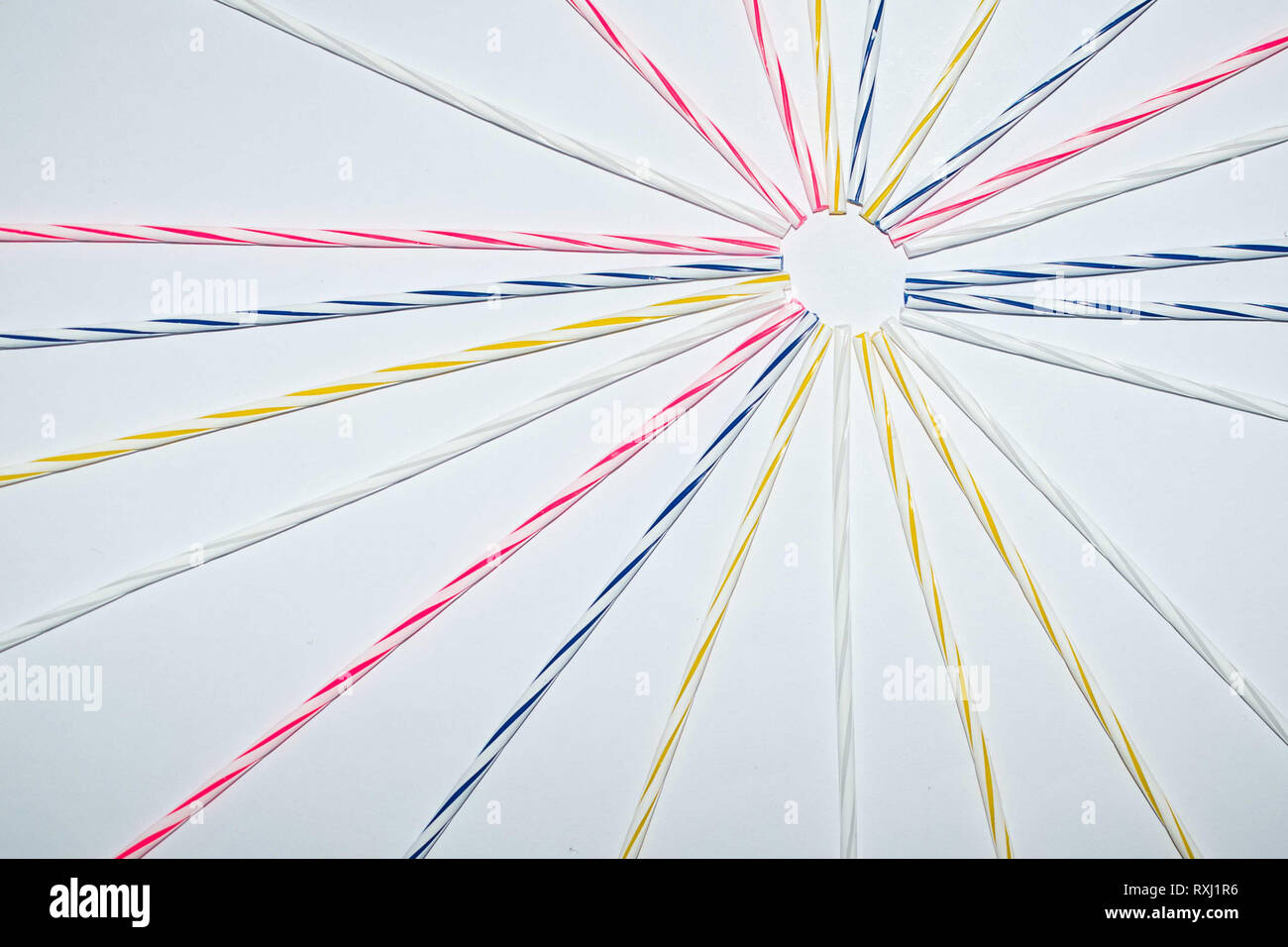 Circle of multi-colored sticks Stock Photo - Alamy