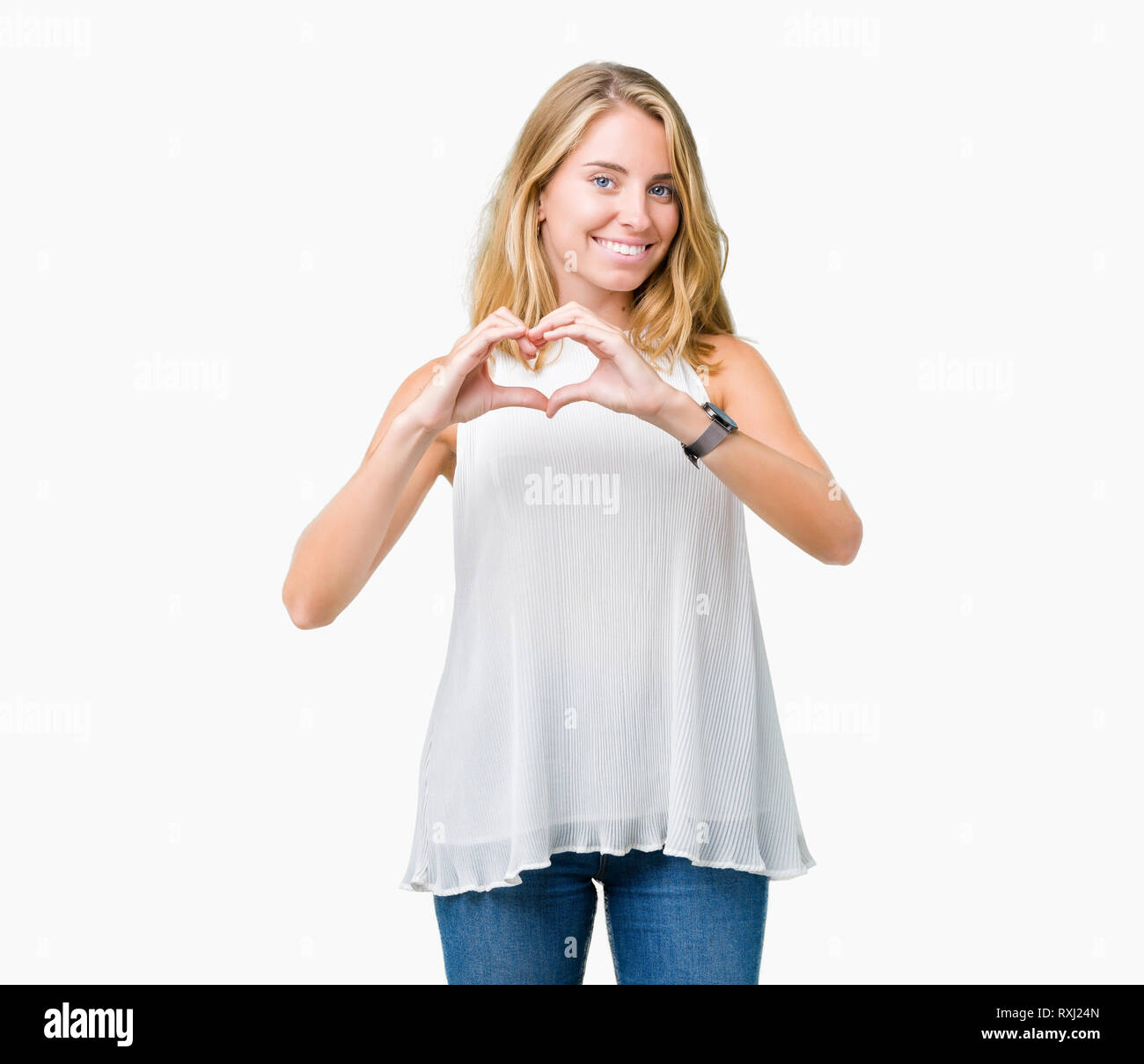 Beautiful young elegant woman over isolated background smiling in love ...