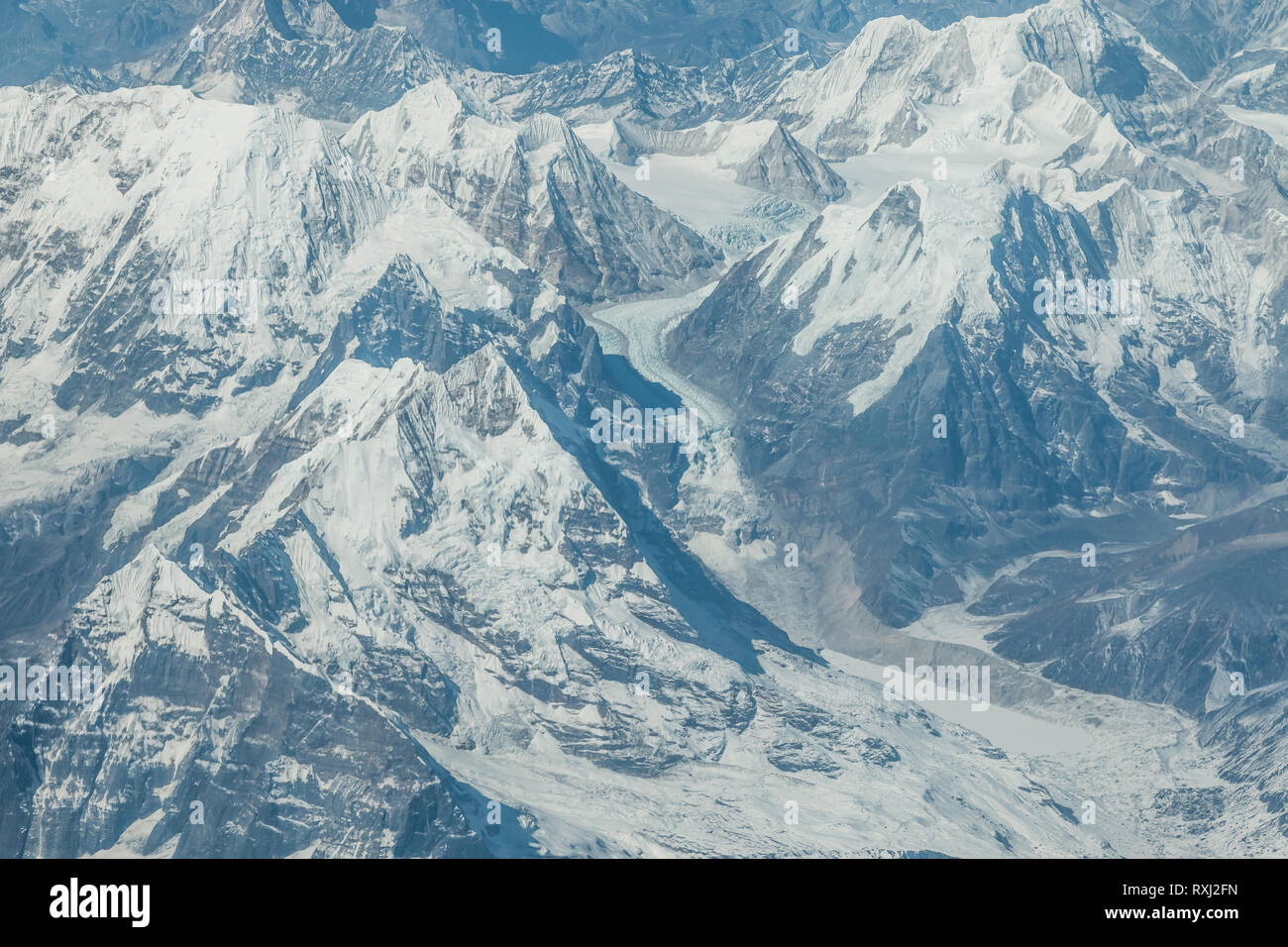 View of Mount Everest and surrounding mountains and snow covered ...