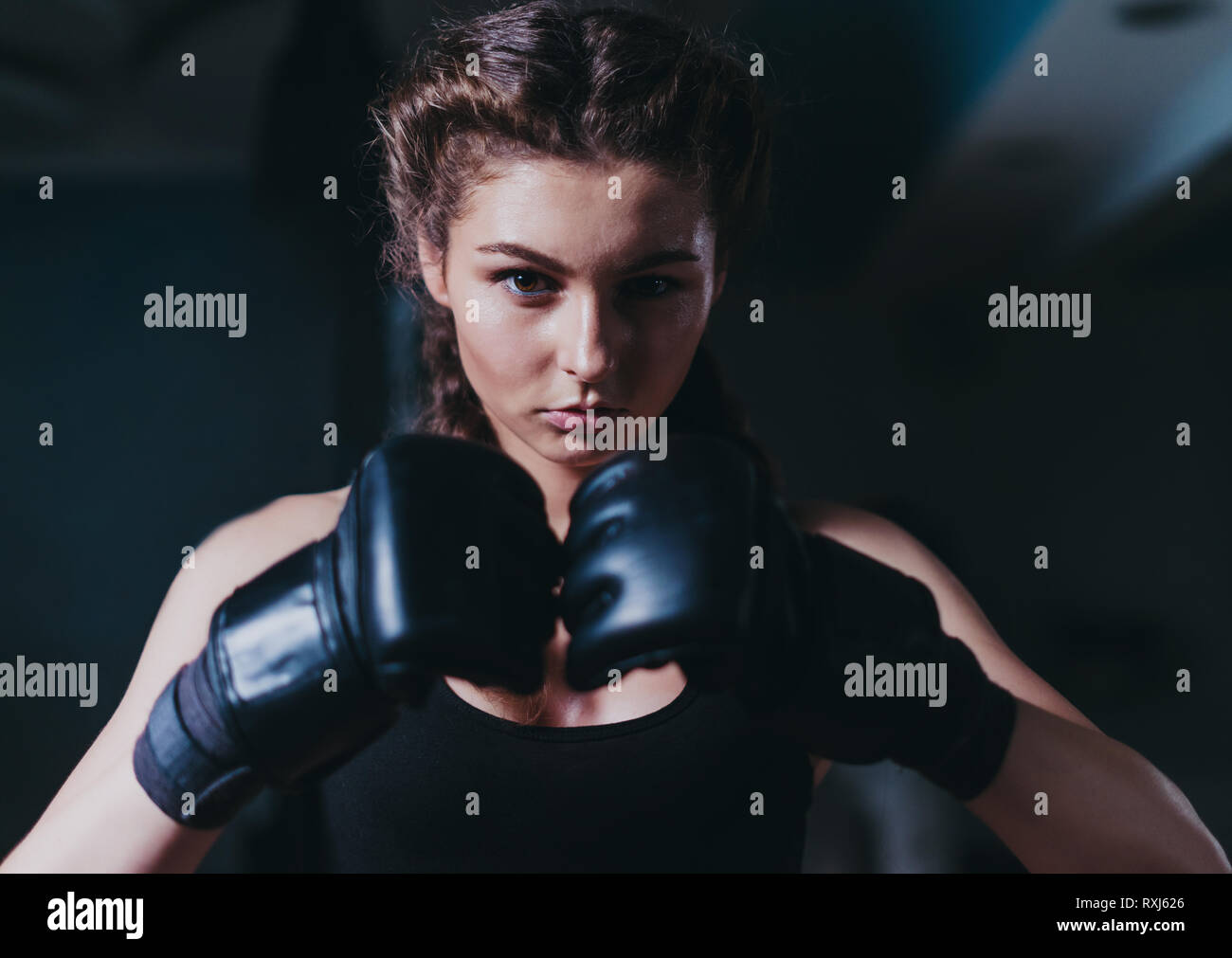 Girl wearing boxing gloves hi-res stock photography and images - Alamy