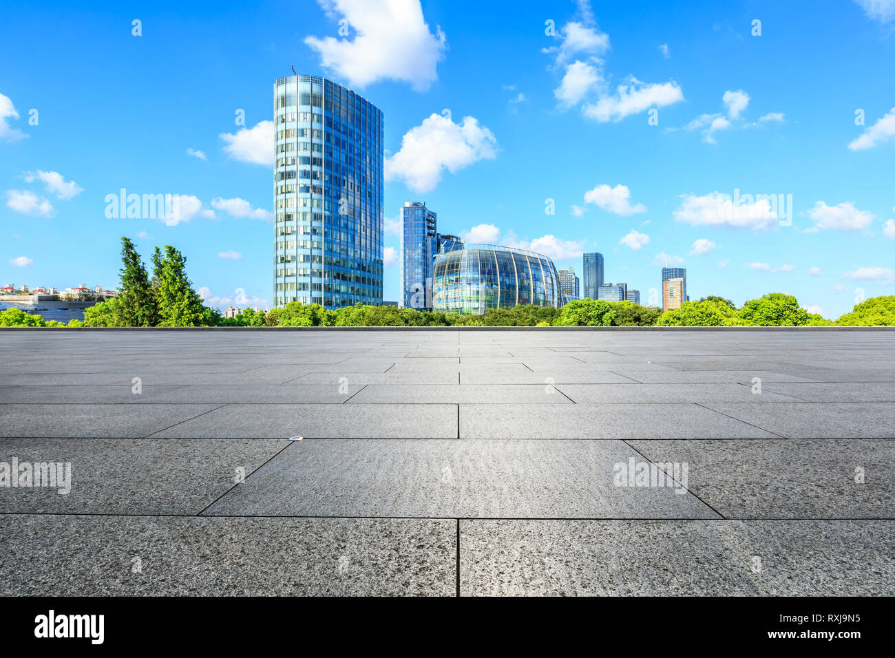 Empty square ground and modern commercial buildings in Shanghai Stock ...