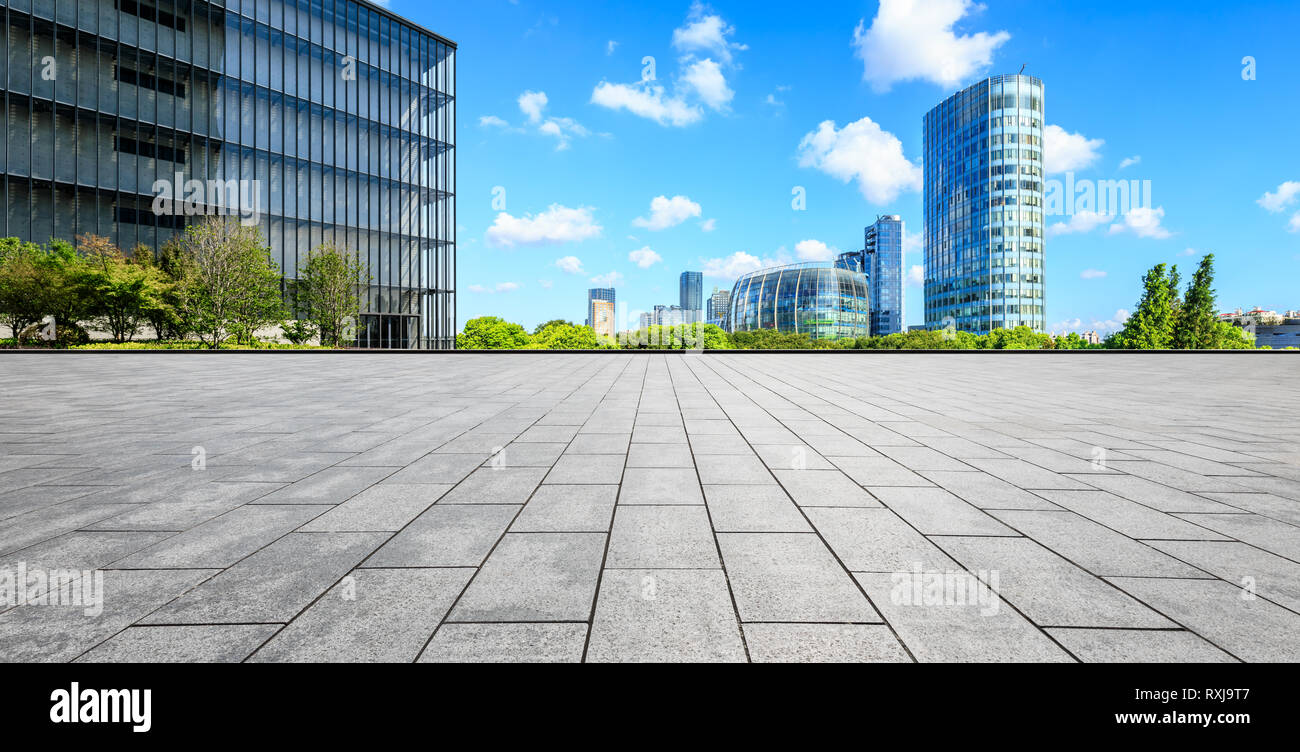 Empty square ground and modern commercial buildings in Shanghai Stock ...