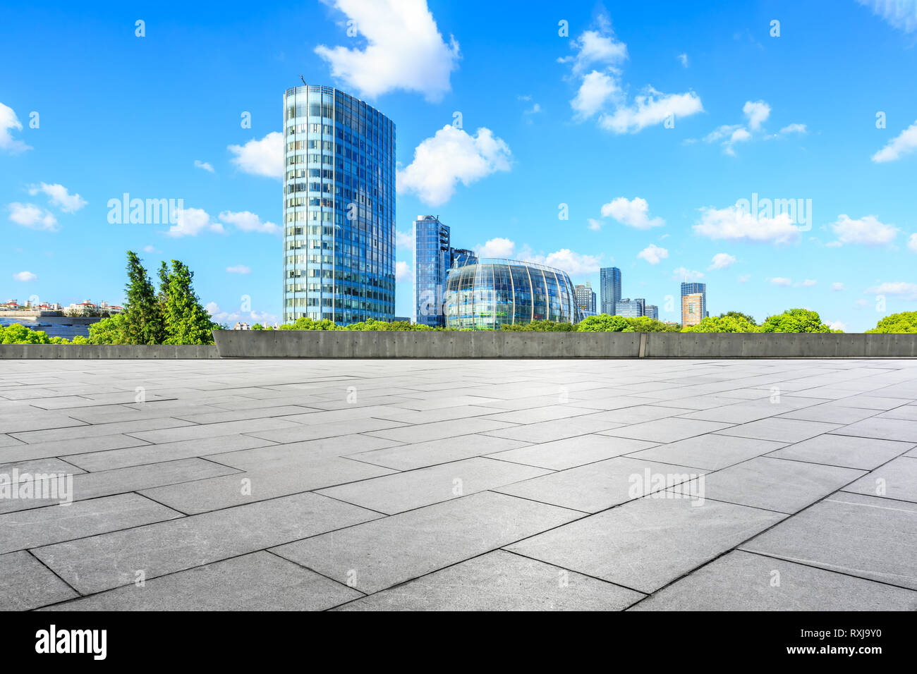 Empty square ground and modern commercial buildings in Shanghai Stock ...