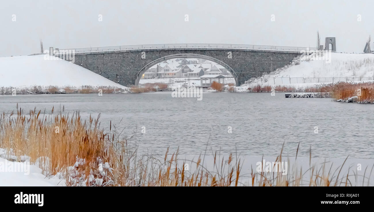 Arched bridge over Oquirrh Lake in Daybreak Utah Stock Photo - Alamy