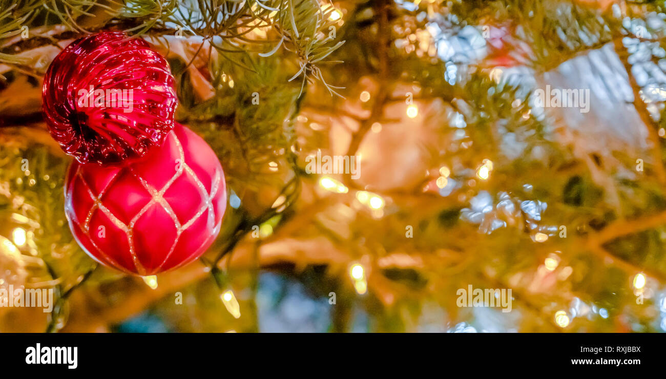 Christmas tree with lights and glittering baubles Stock Photo - Alamy