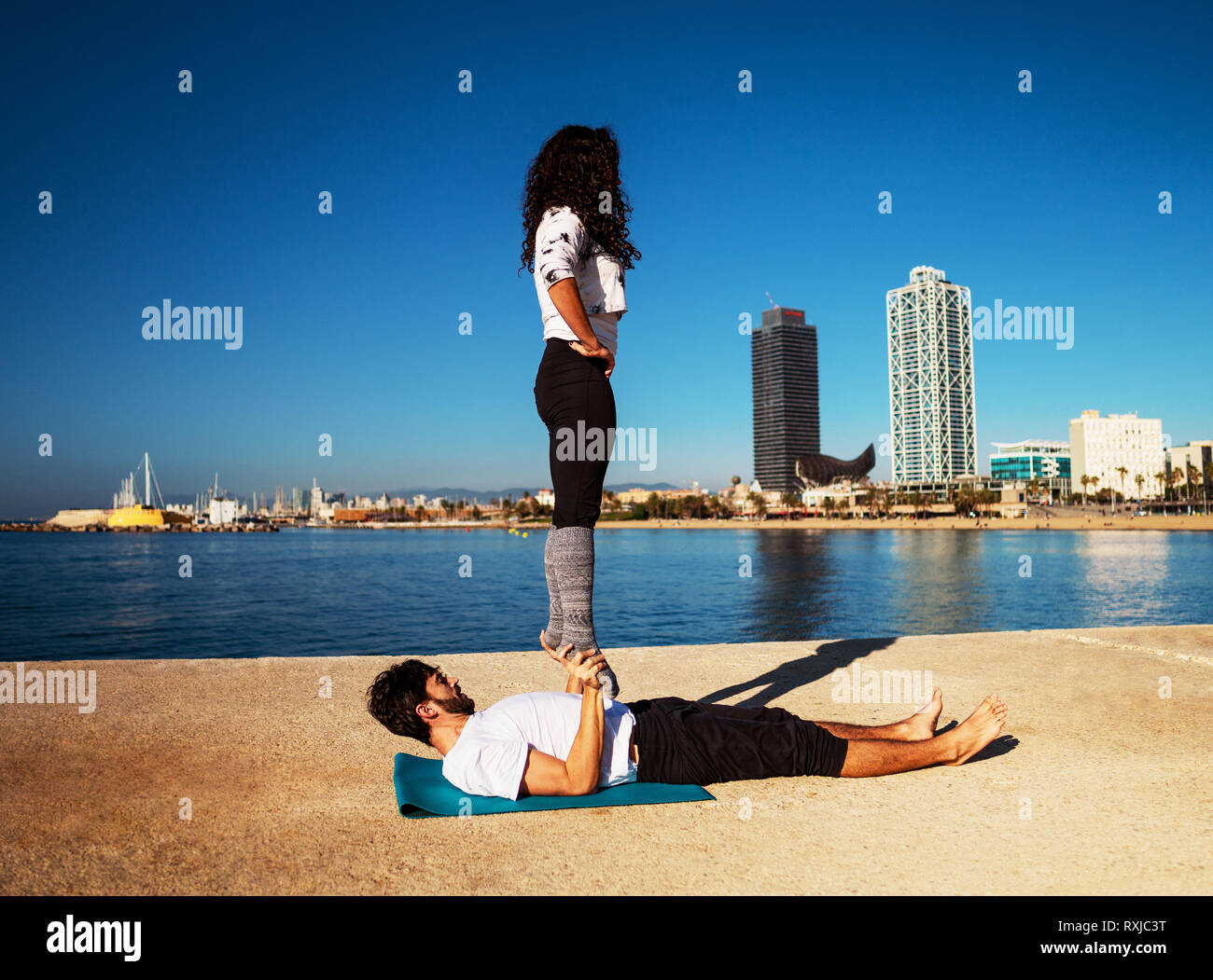 Acro yoga pose hi-res stock photography and images - Alamy