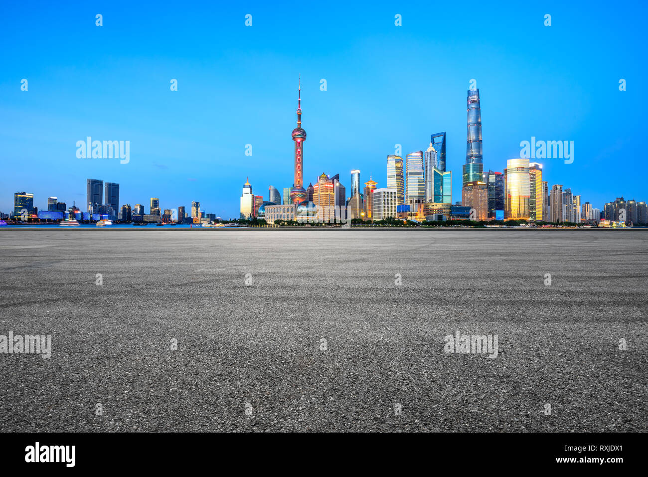 Empty asphalt square ground with panoramic city skyline in Shanghai ...
