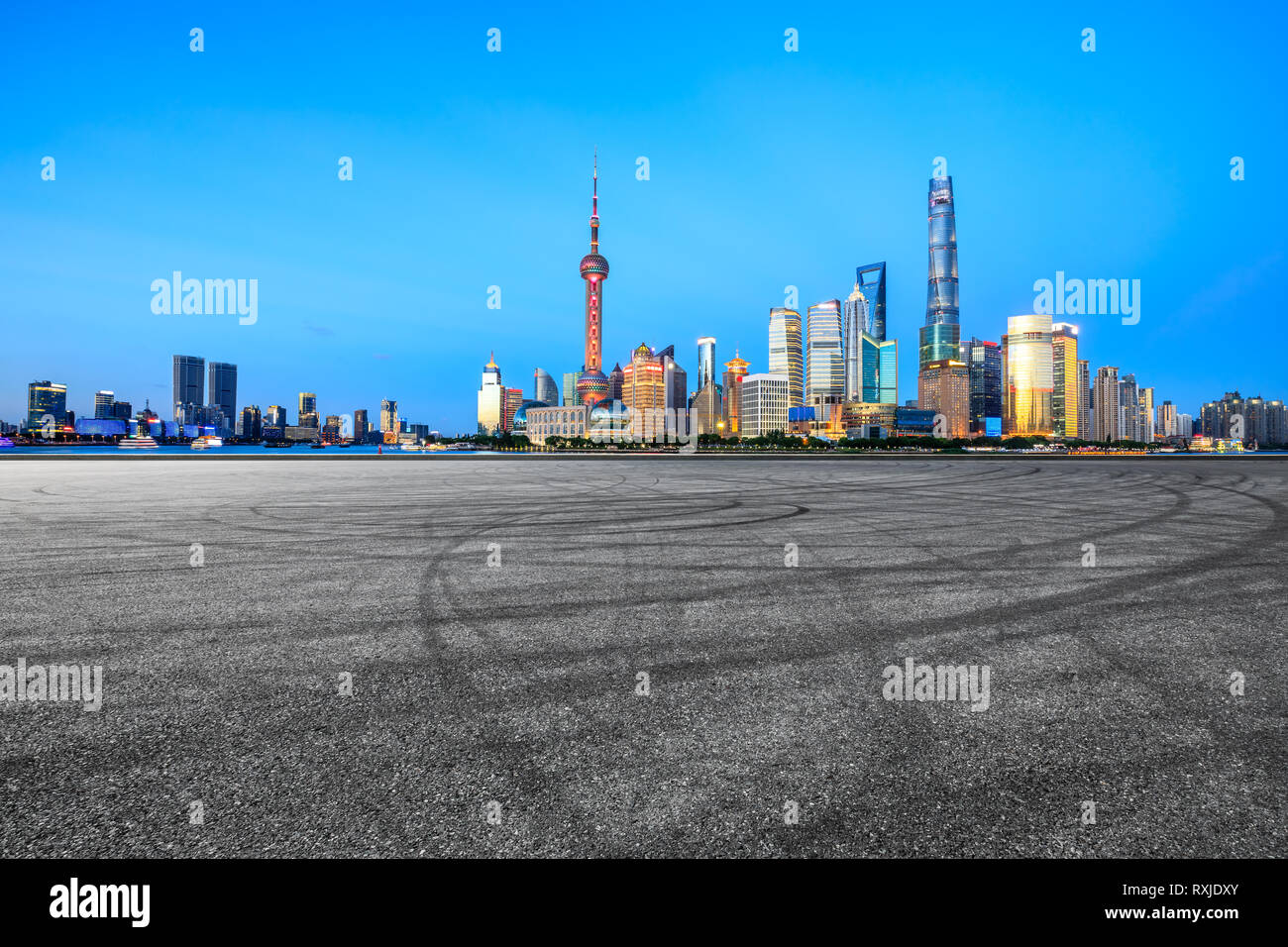 Empty asphalt square ground with panoramic city skyline in Shanghai ...