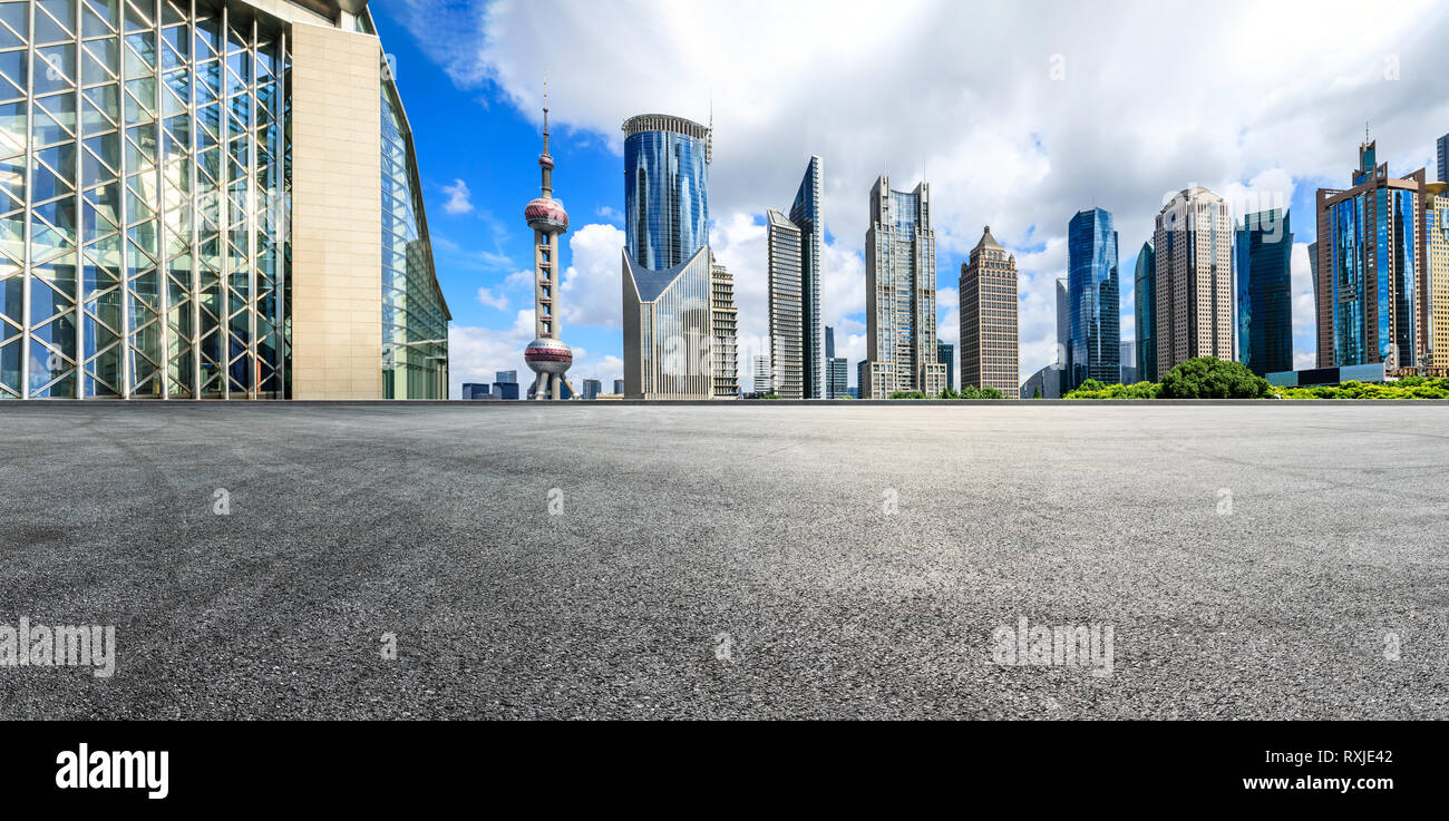 Empty asphalt square ground with panoramic city skyline in Shanghai ...