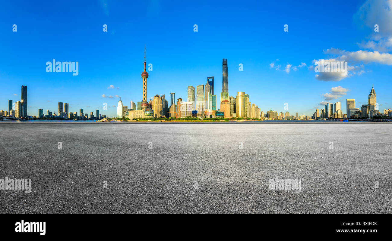 Empty asphalt square ground with panoramic city skyline in Shanghai ...
