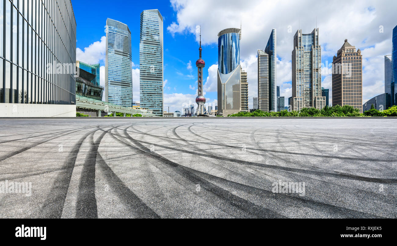 Empty asphalt square ground with panoramic city skyline in Shanghai ...