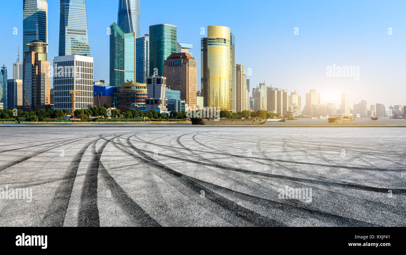 Empty asphalt square ground with panoramic city skyline in Shanghai ...