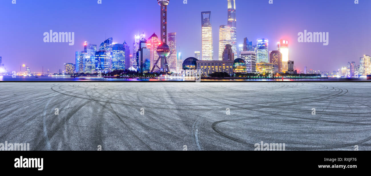 Empty asphalt square ground with panoramic city skyline in Shanghai ...