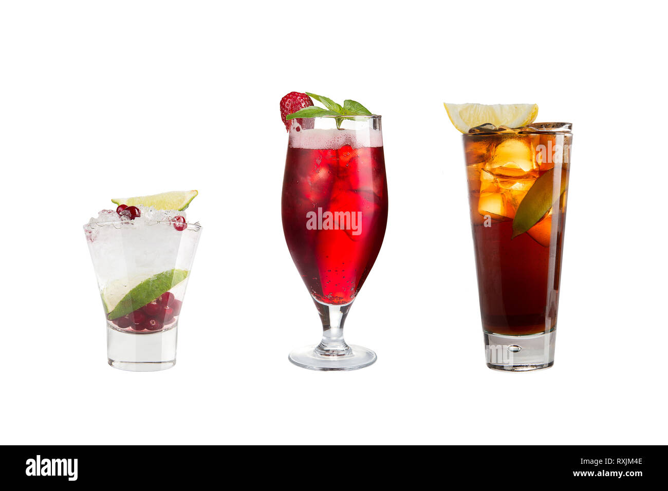 A variety of alcoholic drinks, beverages and cocktails on a white ...