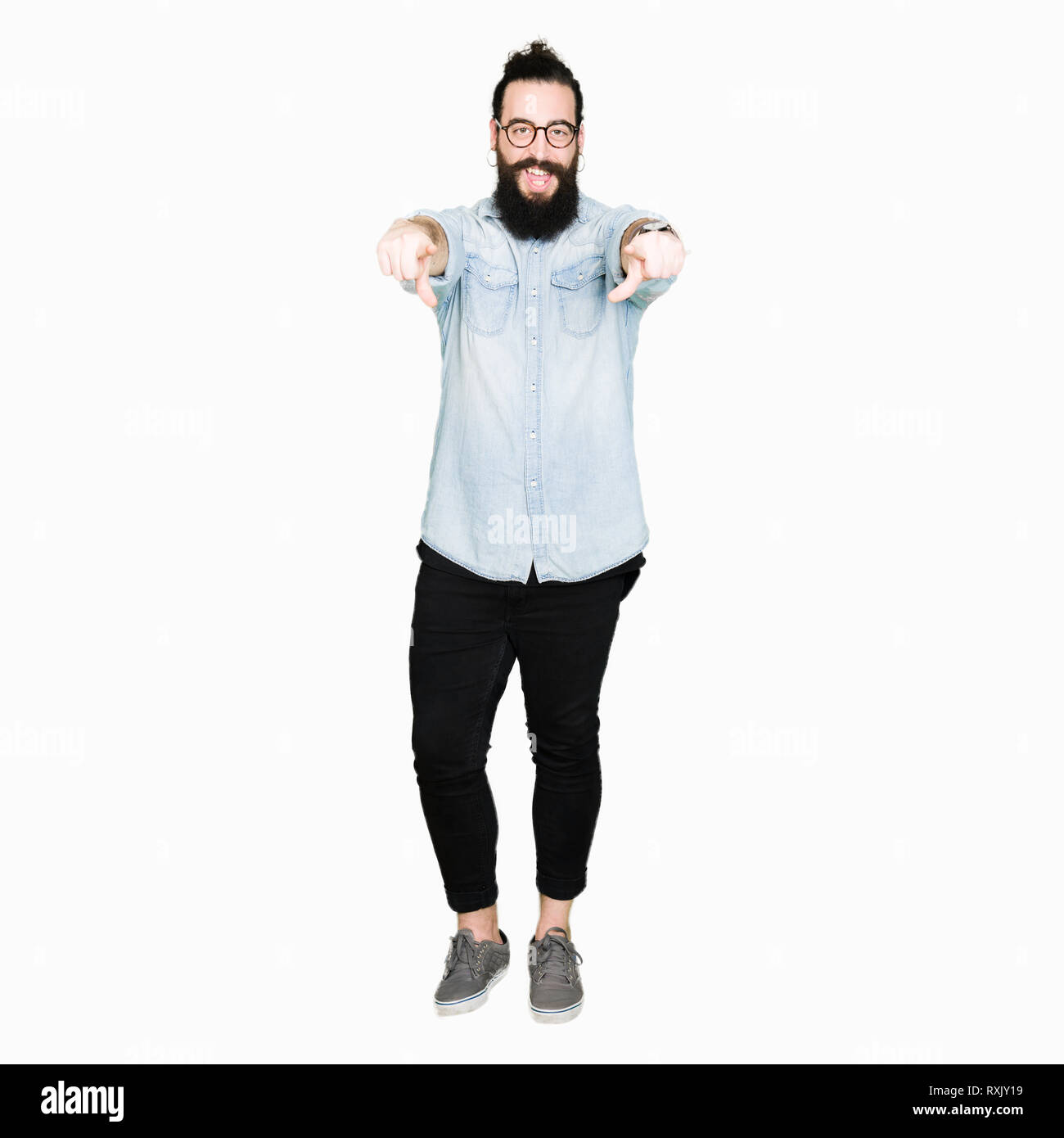 Young man long beard pointing Cut Out Stock Images & Pictures - Alamy