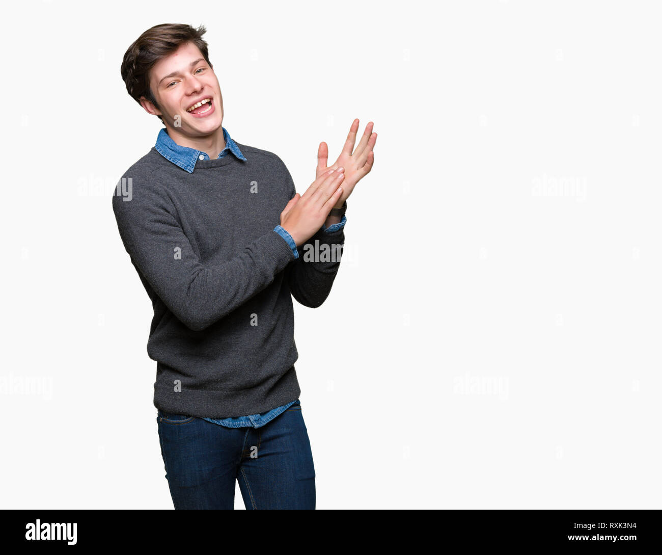 Young handsome elegant man over isolated background Clapping and ...