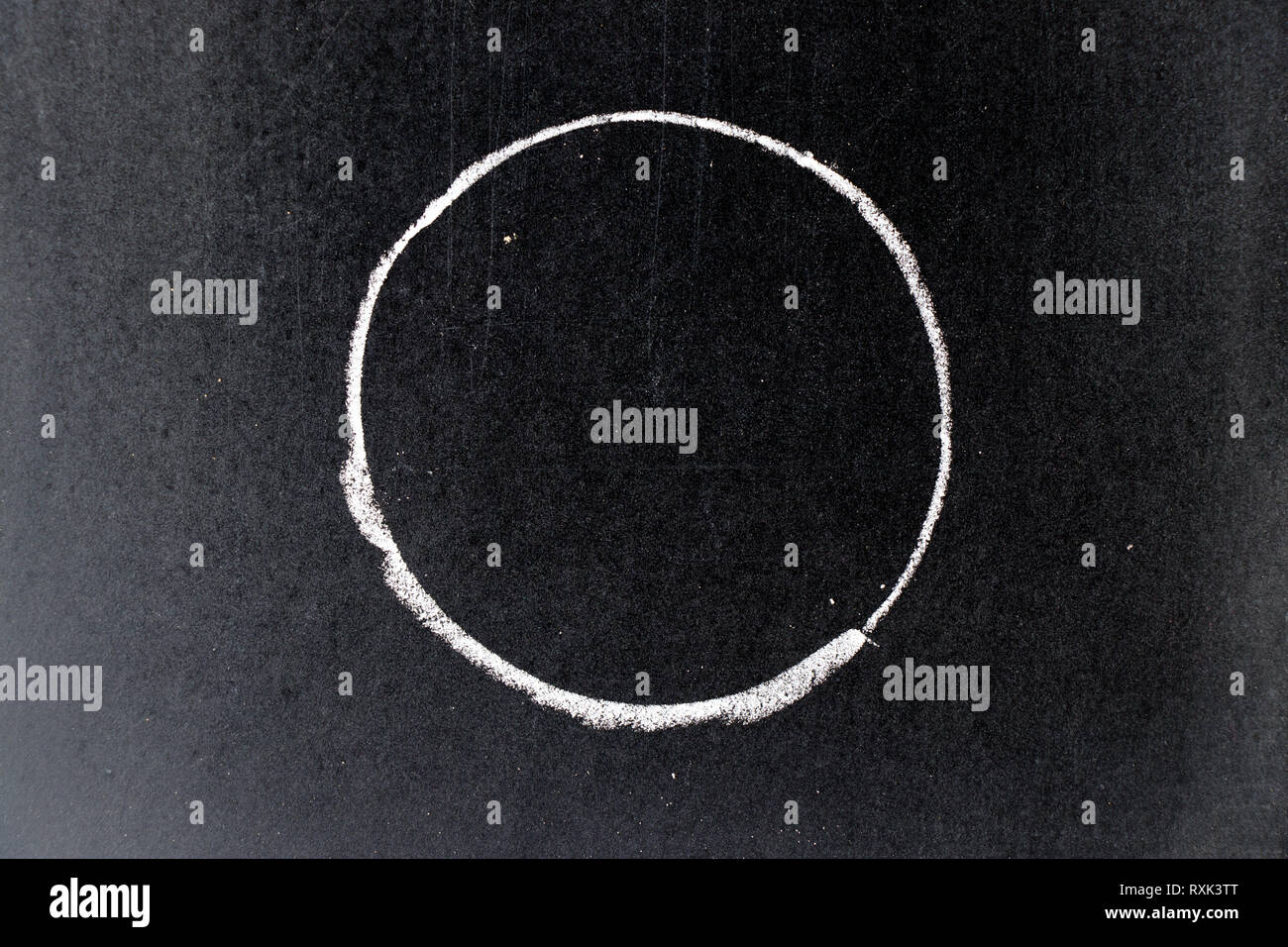 White chalk drawing in circle shape on black board background Stock ...