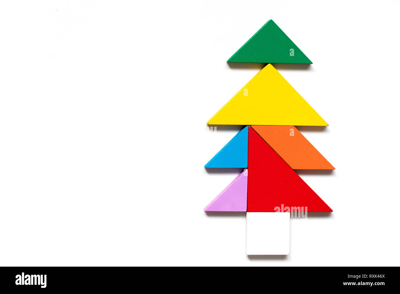Color wood tangram puzzle in tree shape on white background Stock Photo ...