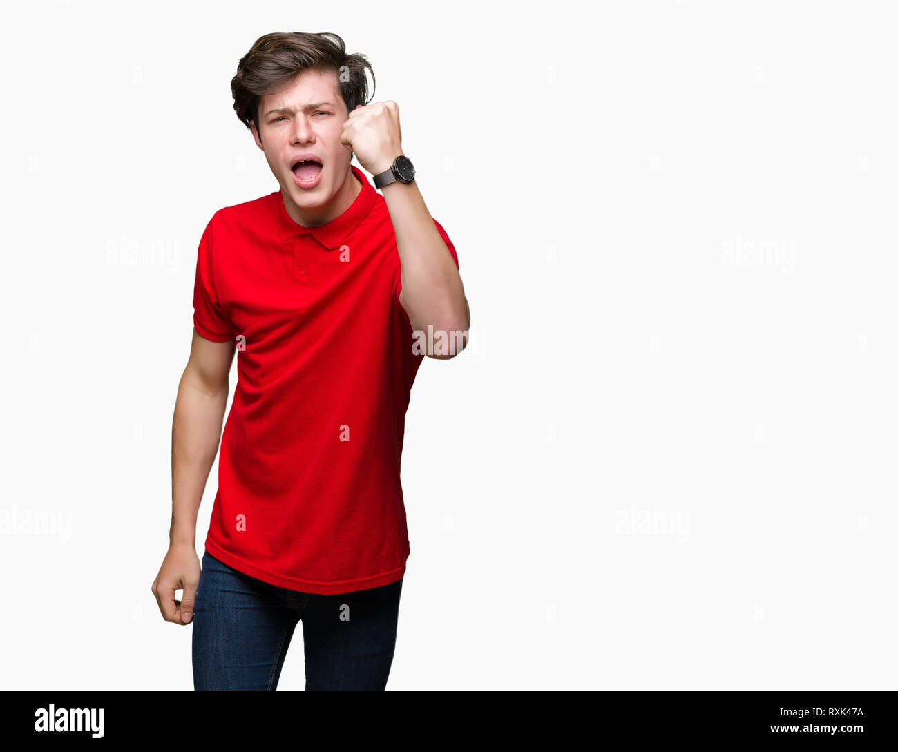 Young handsome man wearing red t-shirt over isolated background angry ...