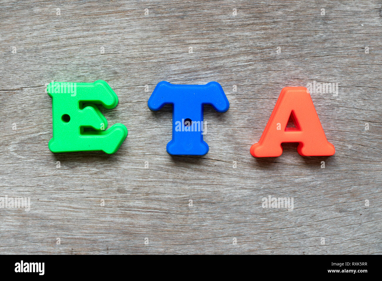 Colorful plastic alphabet in word (Abbreviation of Estimated Time of ...