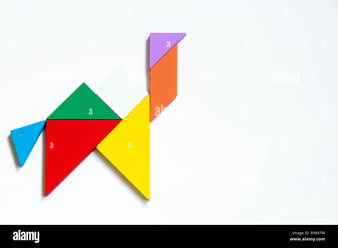 Colorful wood tangram puzzle in camel shape on white background Stock ...