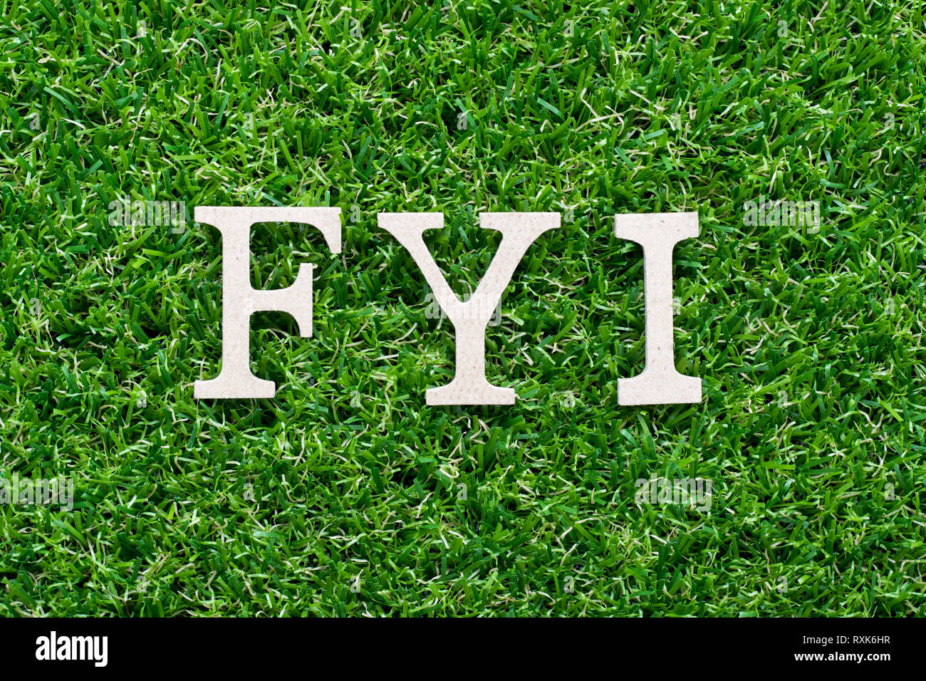 Wood alphabet in word FYI (Abbreviation of For your information) on ...